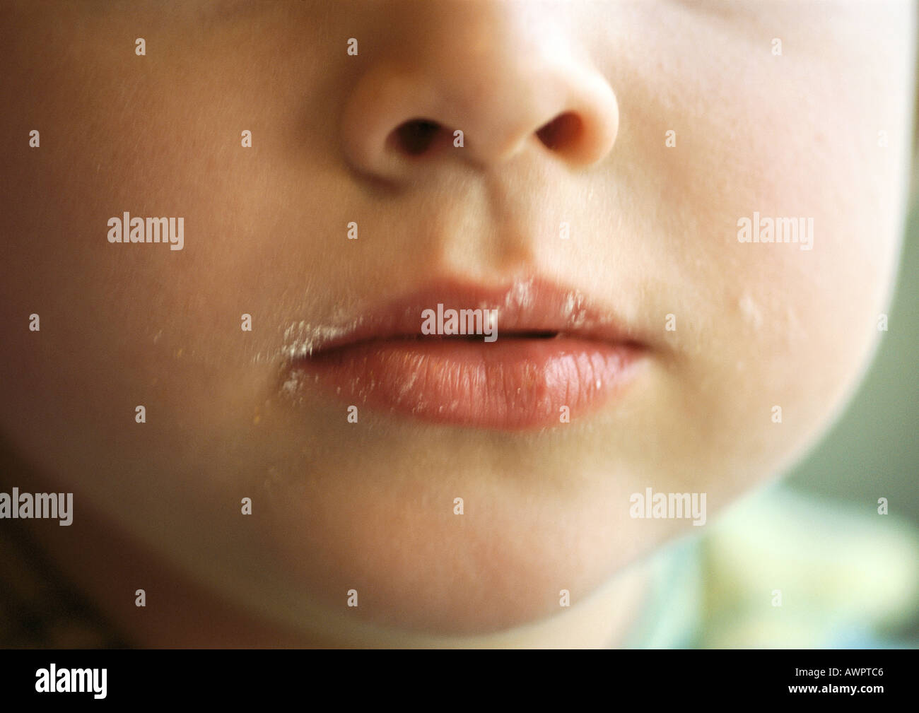 Young child with crumbs on face, close-up of mouth Stock Photo - Alamy