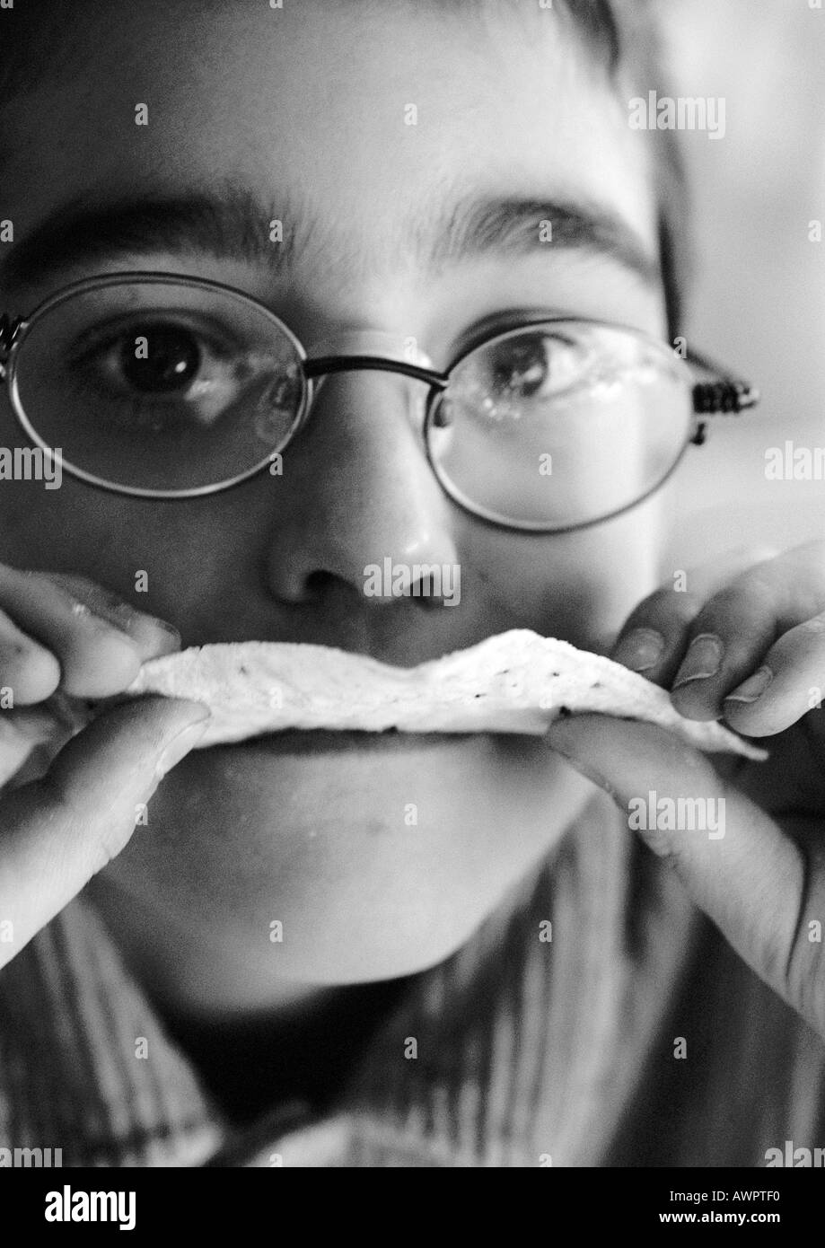 White child eating chips drink hi-res stock photography and images - Alamy