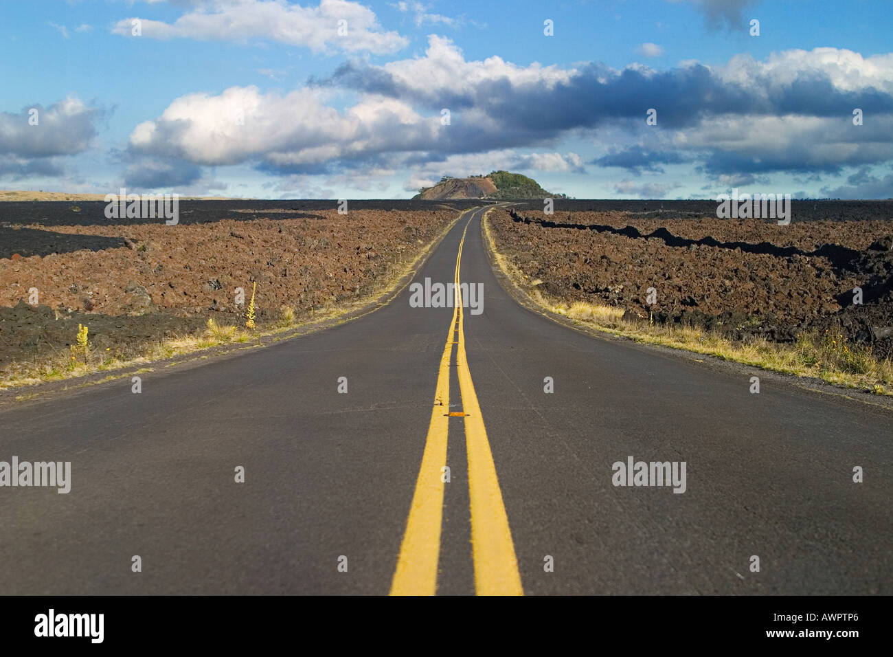 Saddle Road and Pu`u Huluhulu, an old cinder cone created by Mauna Kea ...