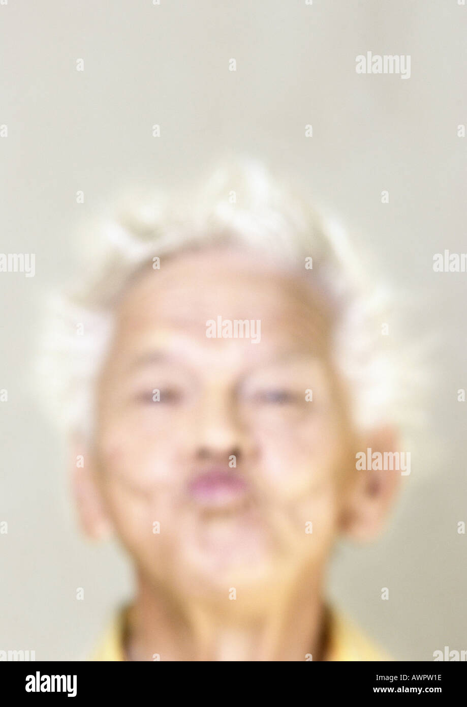 Man puckering lips hi-res stock photography and images - Alamy