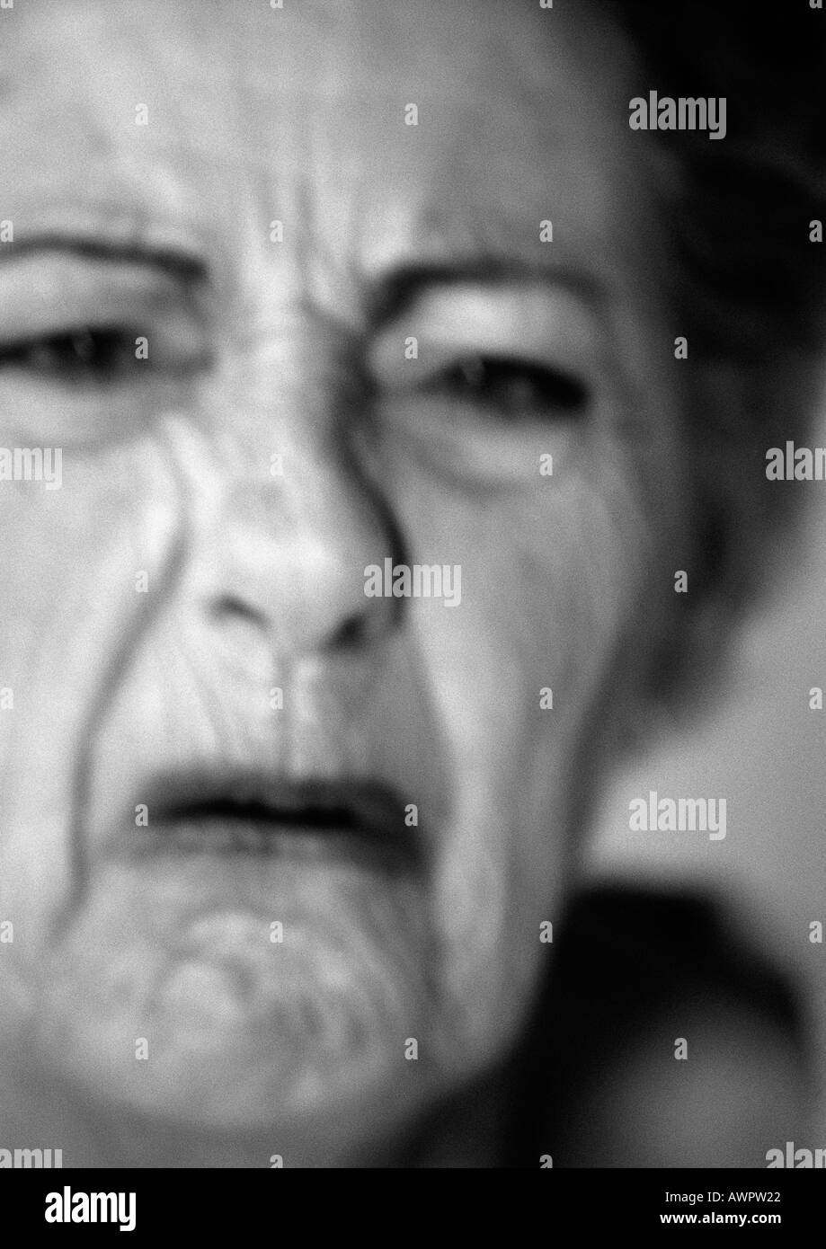 Senior woman crying on Black and White Stock Photos & Images - Alamy