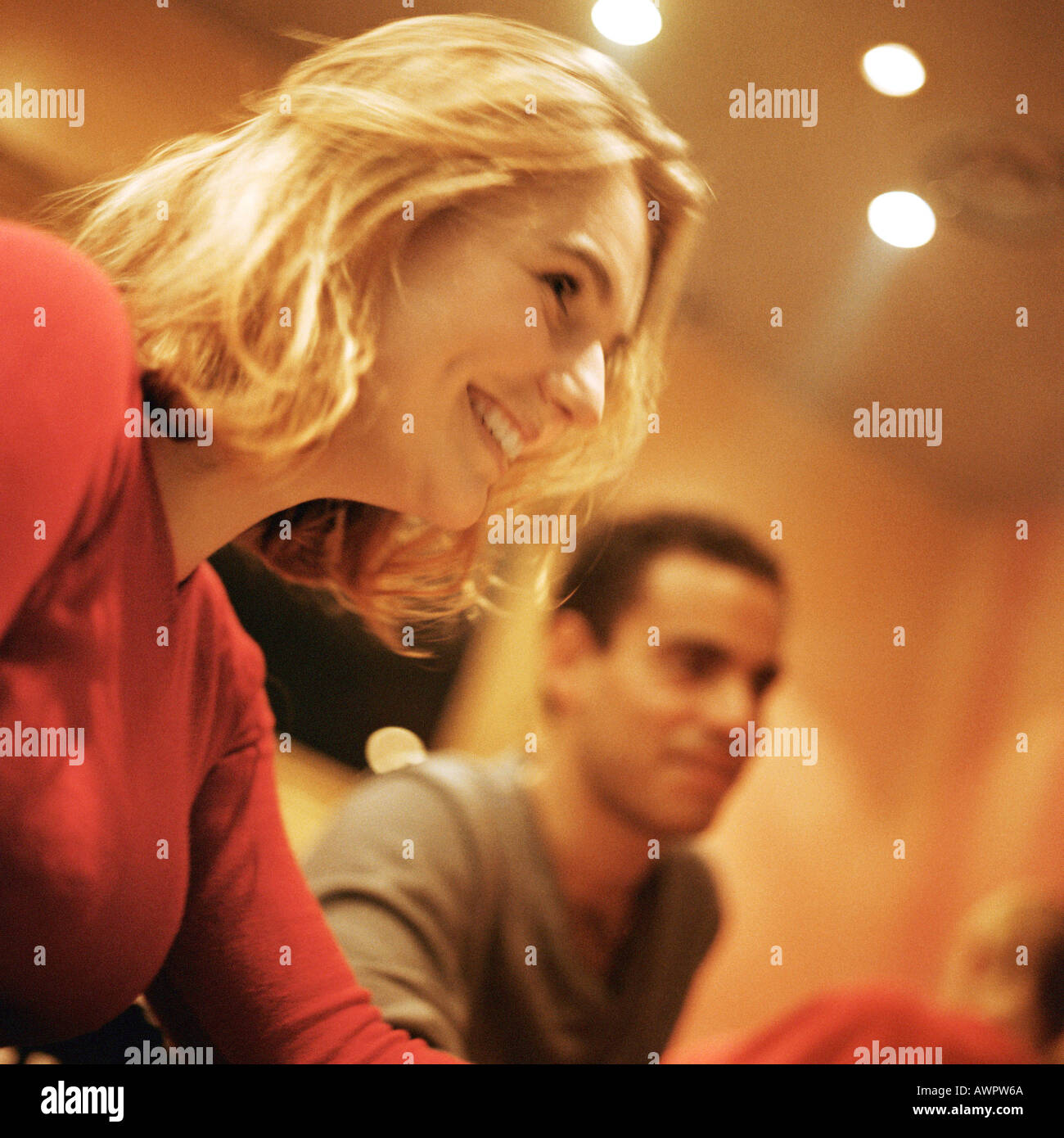 Young woman and man, side view Stock Photo - Alamy