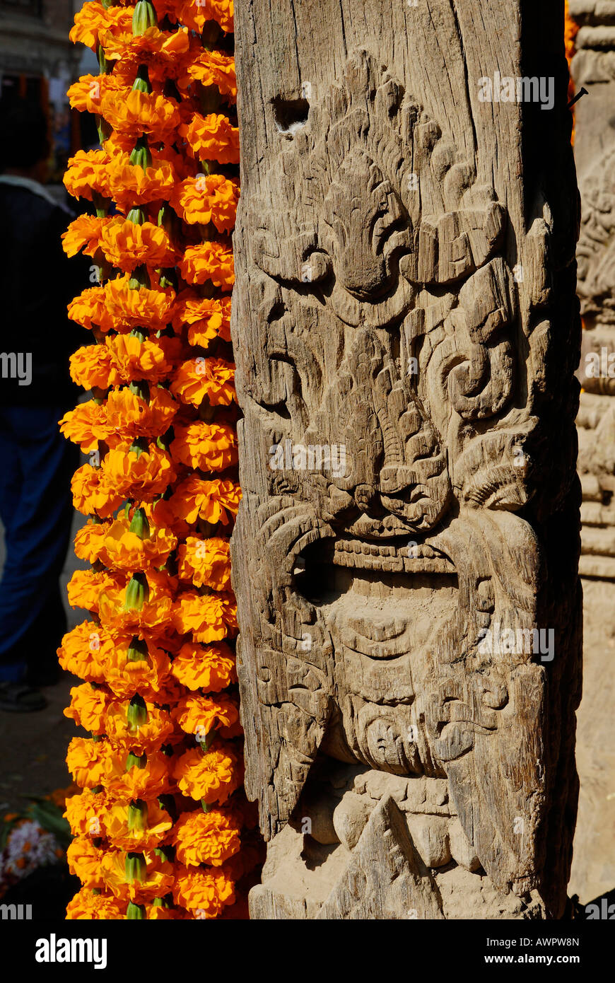 Carved wooden coloumn with flower decoration, Patan, Kathmandu, Nepal ...