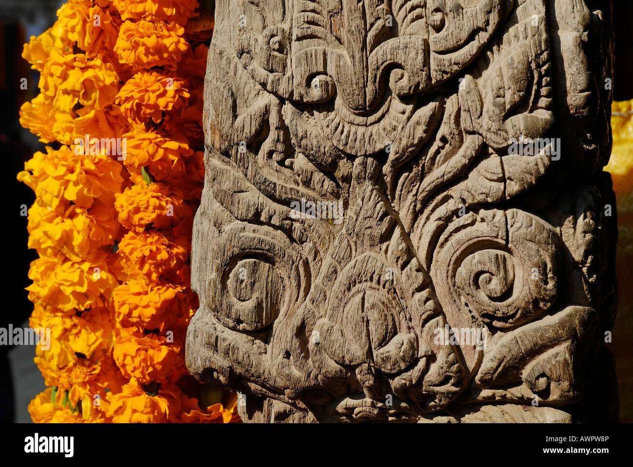 Carved wooden coloumn with flower decoration, Patan, Kathmandu, Nepal ...