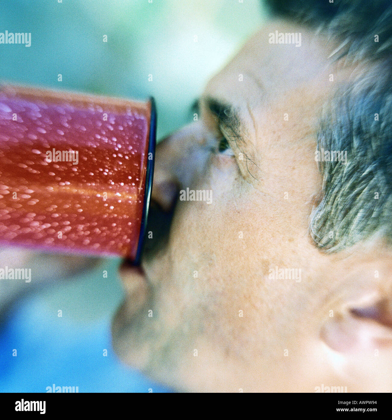 Profile of man drinking Stock Photo - Alamy