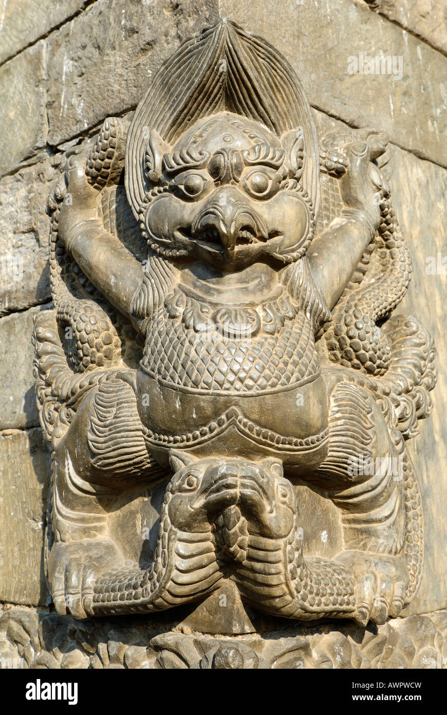 Hinduistic stone sculpture, Garuda and Cobra, Ghats of Pashupatinath ...