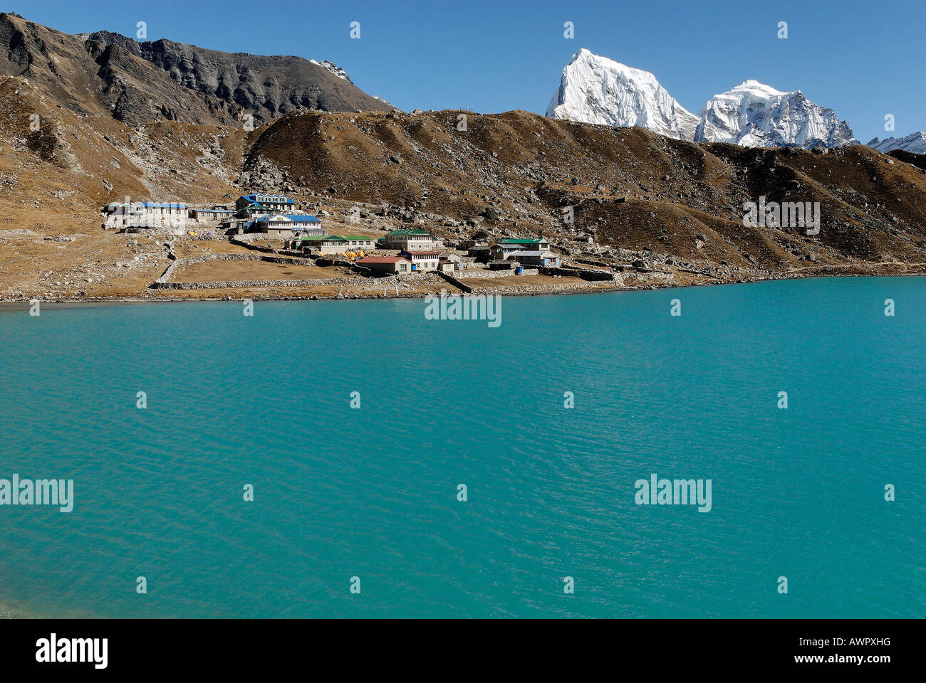Holy lake Dudh Pokhari with Gokyo Sherpa village, Sagarmatha National ...