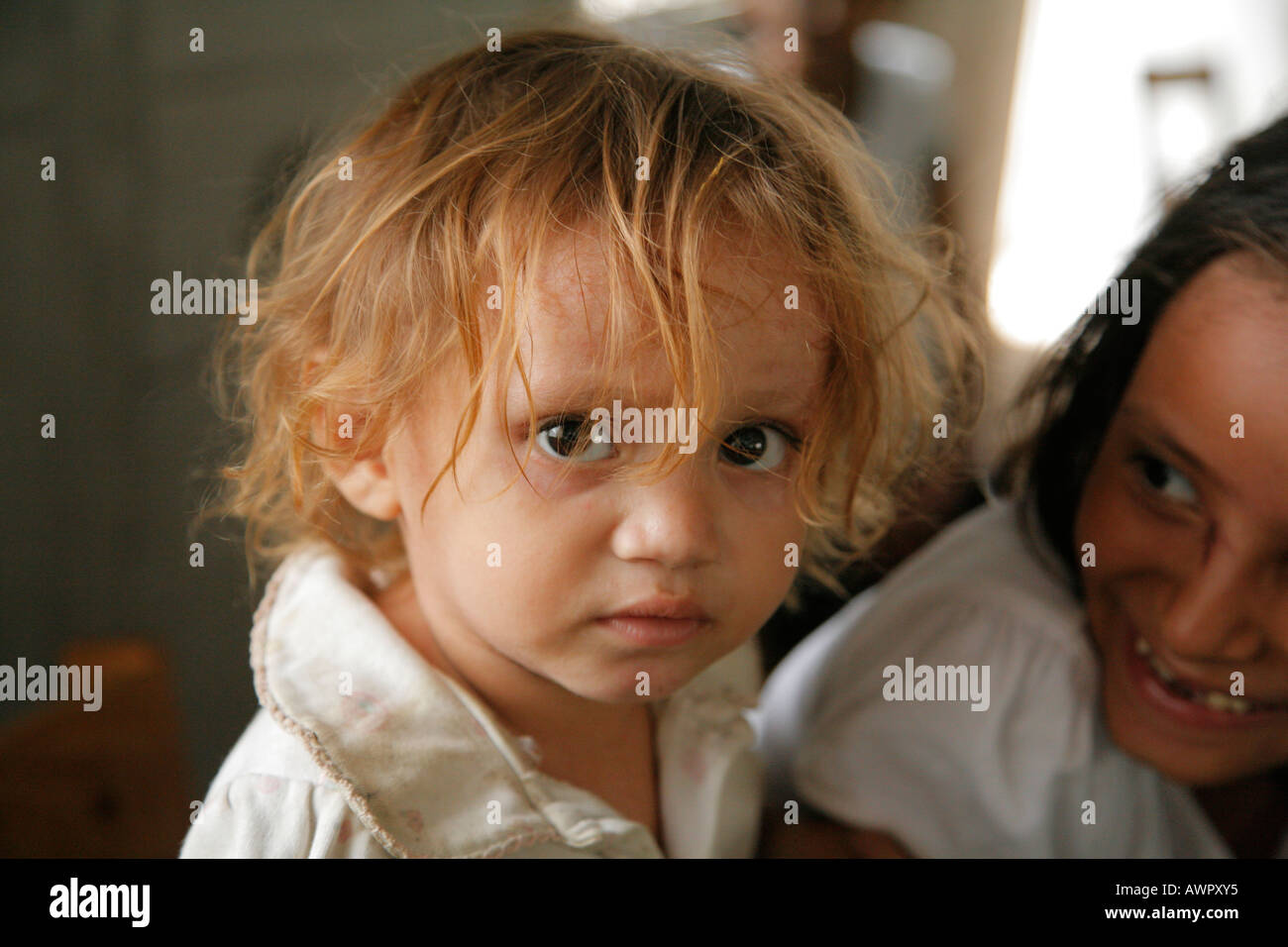 HONDURAS Children at a free feeding program The slum barrio of ...
