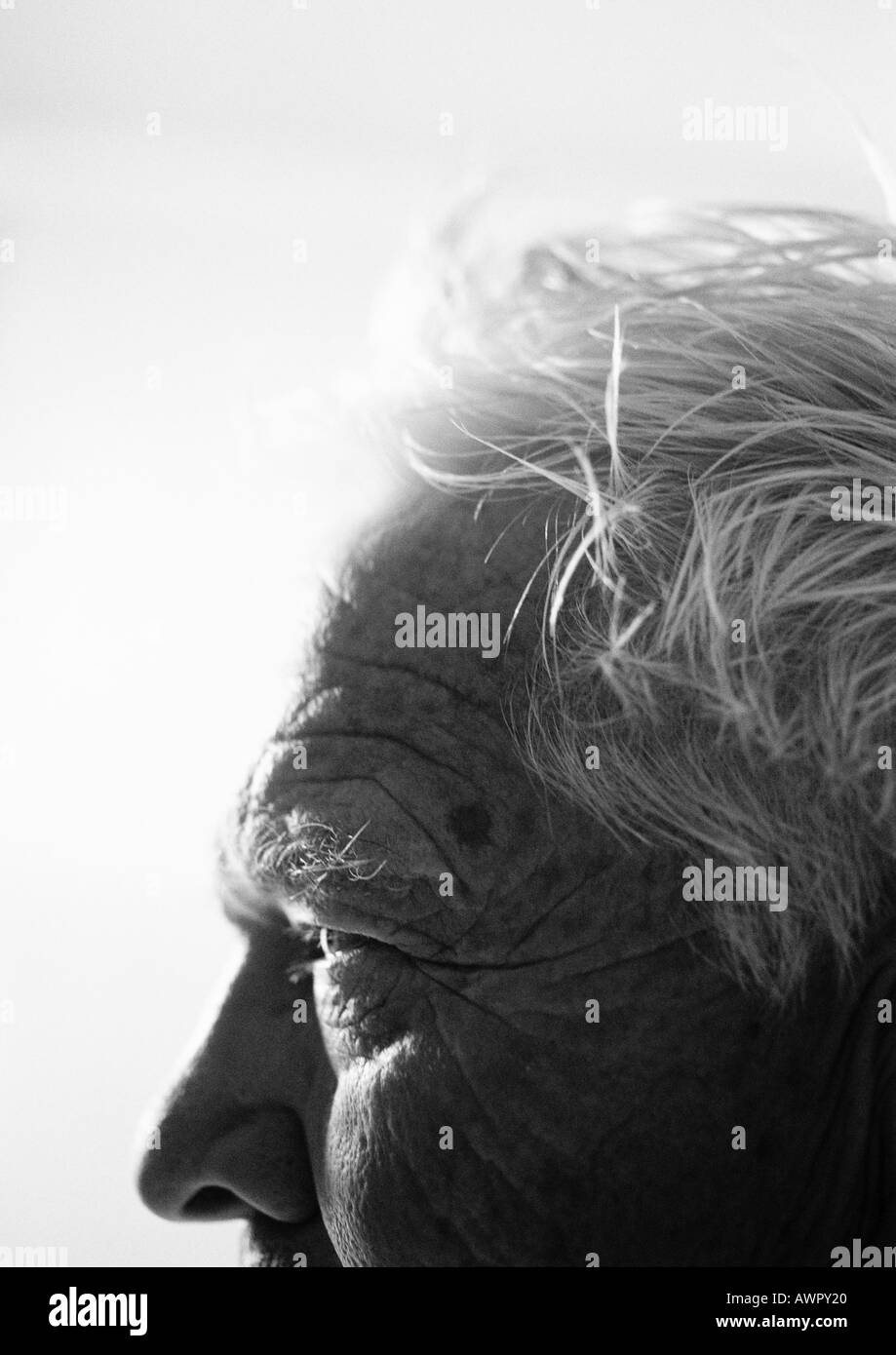 Senior man's upper face, side view, b&w Stock Photo - Alamy