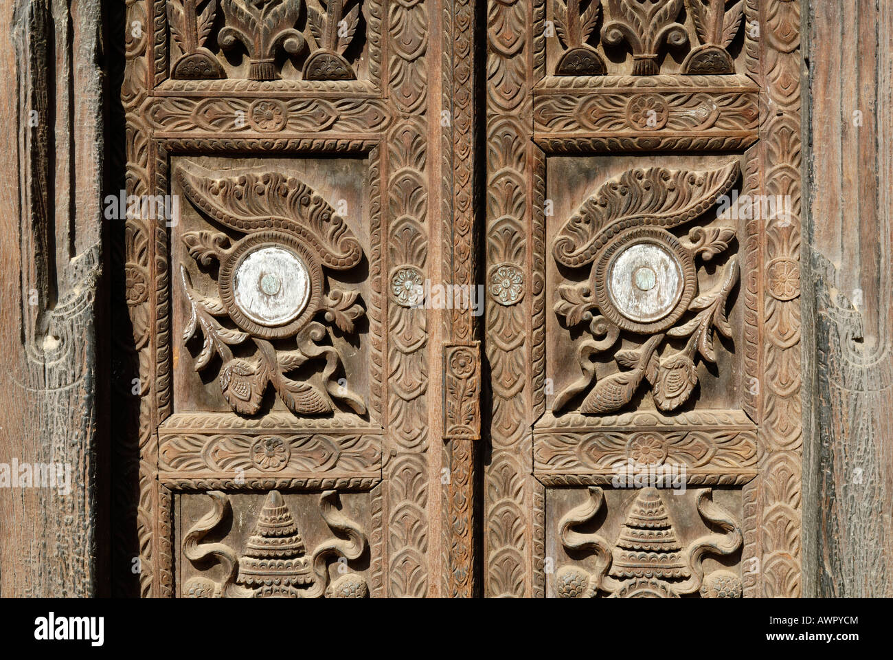 Carved wooden door in the old town of Bhaktapur, Kathmandu valley ...