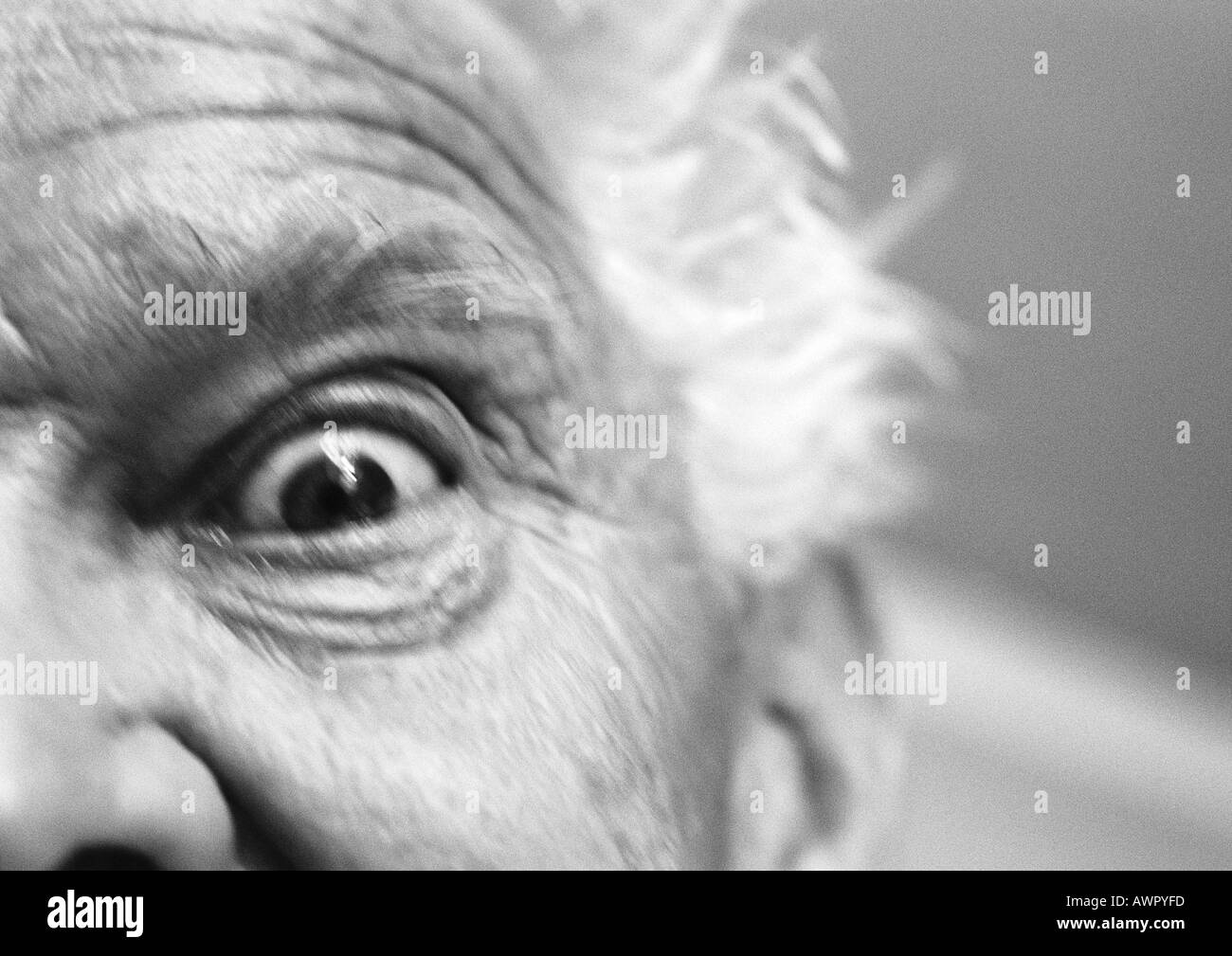 Senior man staring at camera, low angle partial view, b&w Stock Photo ...