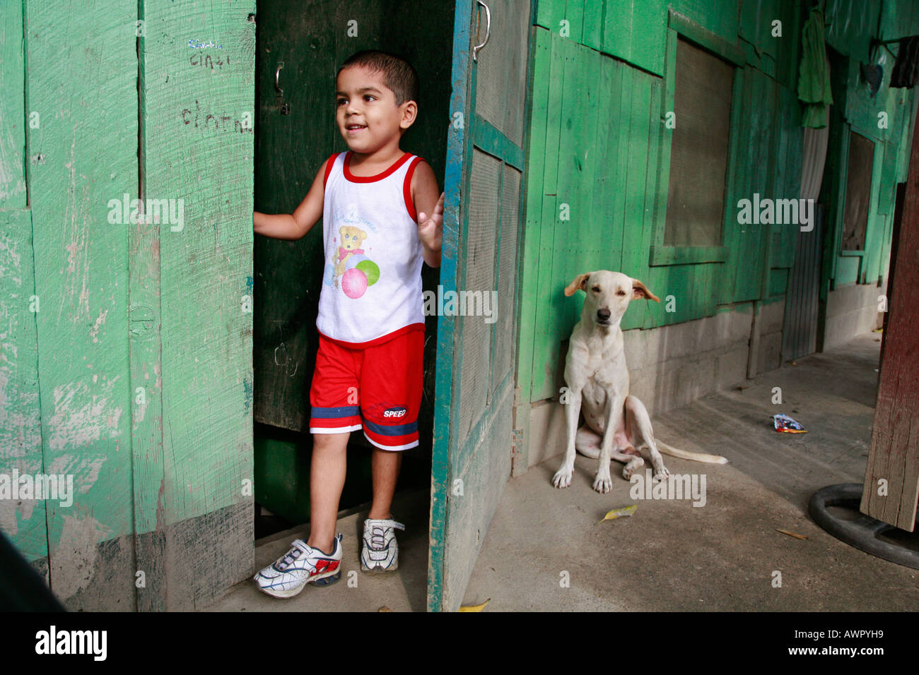 HONDURAS Boy and dog The slum barrio of Chamelecon San Pedro Sula ...