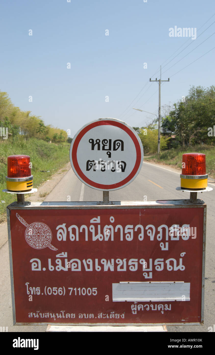 road sign near phetchabun, thailand, advising road users of a police ...