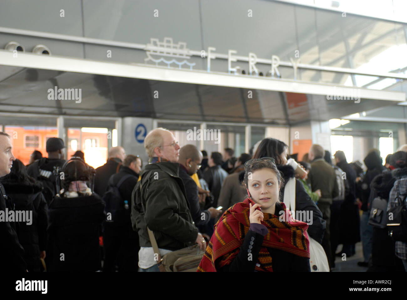 Passengers wait at the St George Terminal of the Staten Island Ferry ...