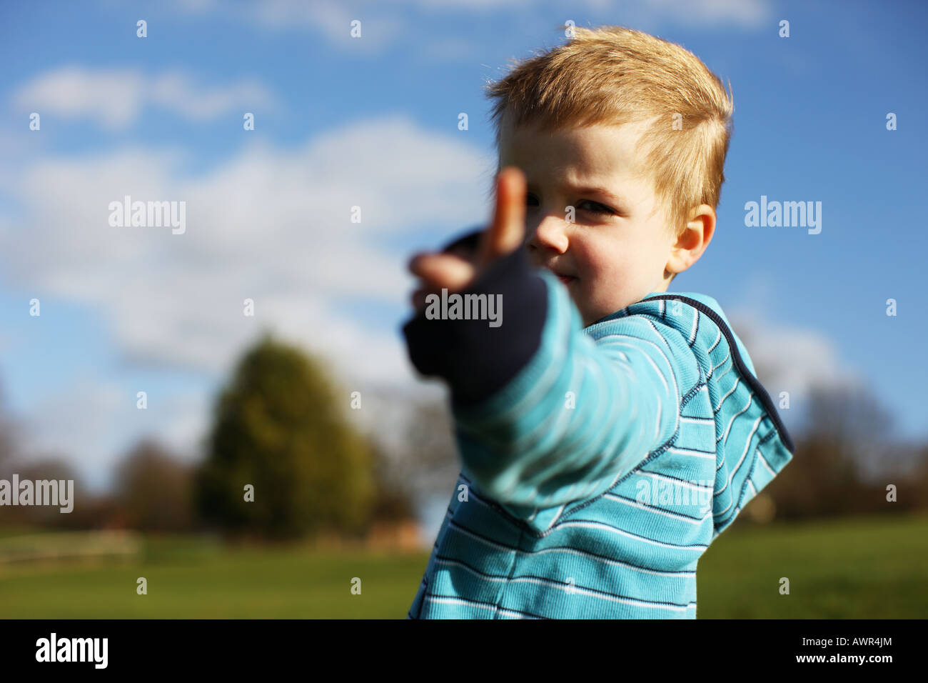 boy playing outside Stock Photo - Alamy