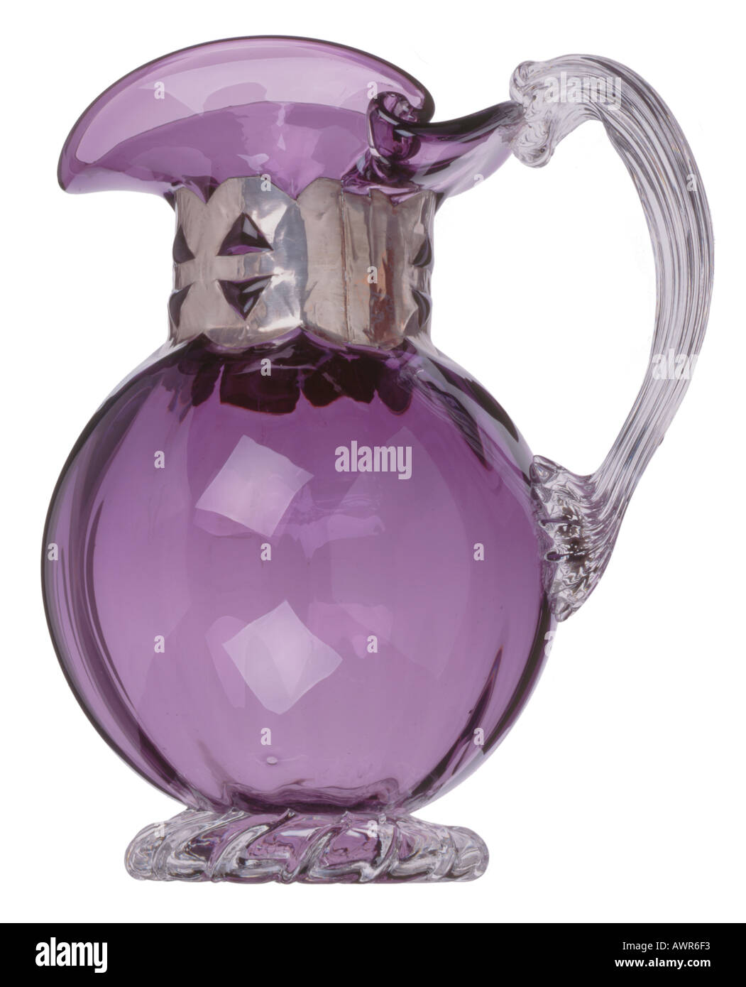 Mauve glass jug with silver neck and ornate handle Stock Photo - Alamy