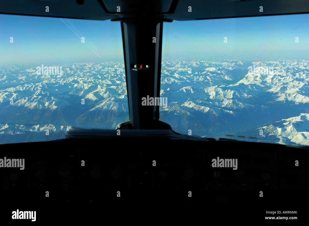 View from the cockpit of an Airbus 321, in flight over the Alps Stock ...