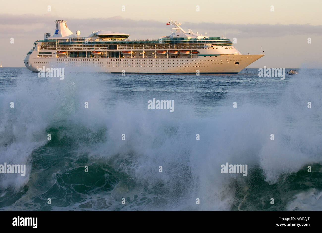 Cruise Ship and Large Breaking Wave Stock Photo - Alamy