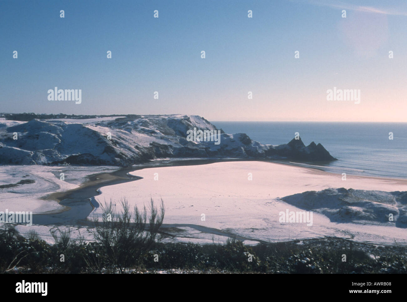 Three Cliffs Bay in Snow Gower South Wales Stock Photo - Alamy