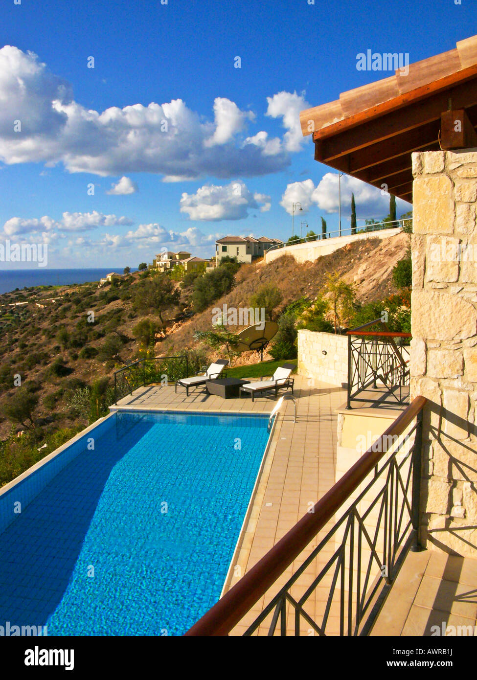 Balcony view of infinity pool at a villa in "Aphrodite Hills" Cyprus EU Stock Photo - Alamy