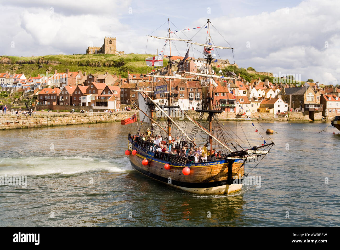The tourist pleasure boat Bark Endeavour Whitby entering the harbour at ...