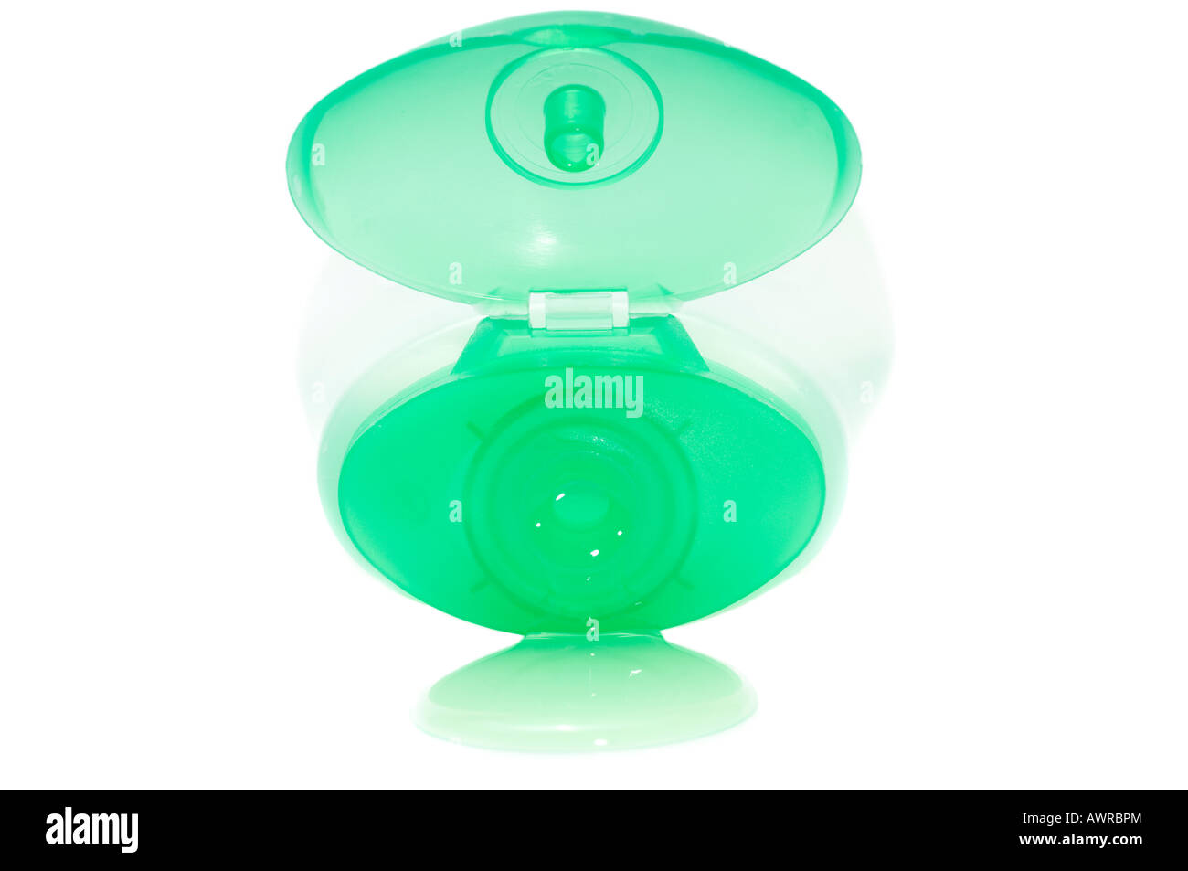 Bottle of green shampoo spilling on to a white surface Stock Photo - Alamy