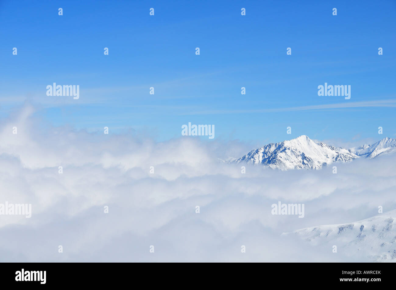 The Pyrenees in clouds with the peaks showing -Andorra (Spain) - Winter ...