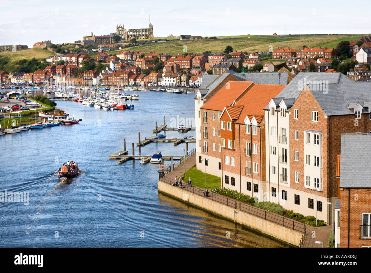 Modern housing built beside the River Esk at Whitby, North Yorkshire ...
