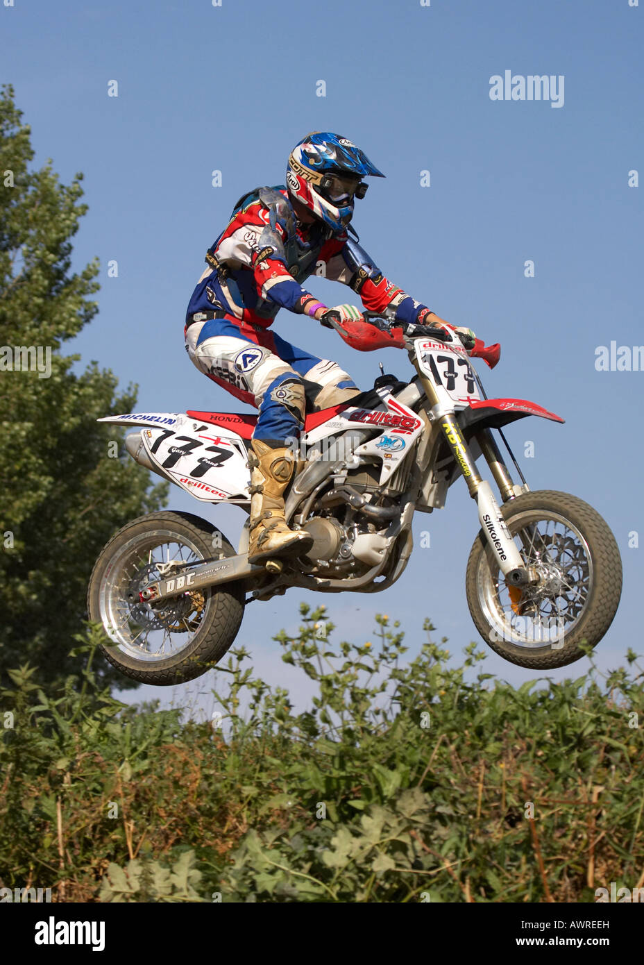 Motox rider jumping Stock Photo - Alamy