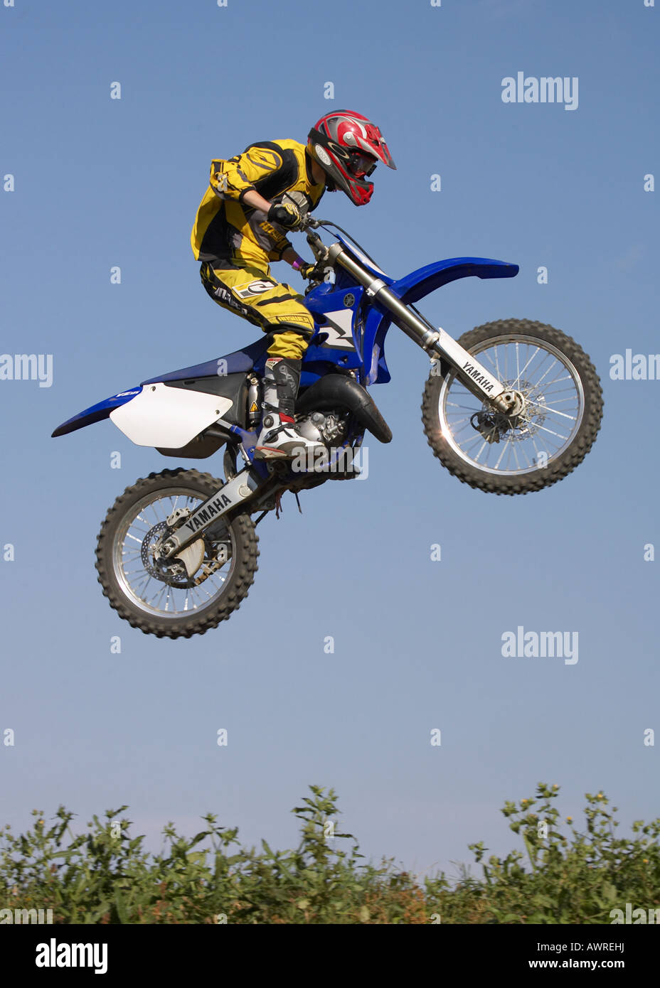 Motox rider jumping Stock Photo - Alamy