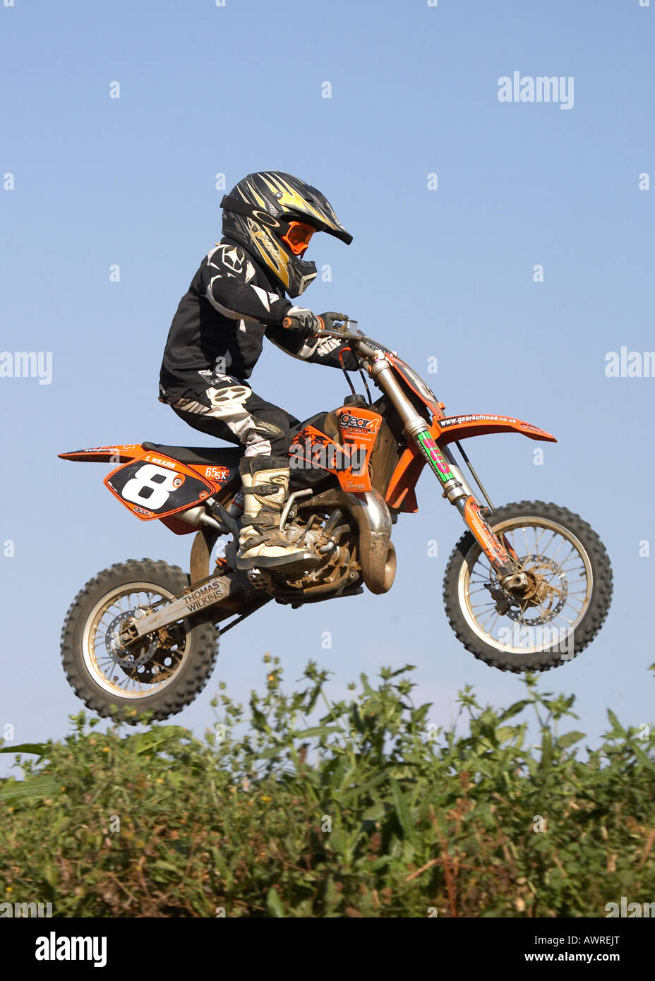 Motox rider jumping Stock Photo - Alamy