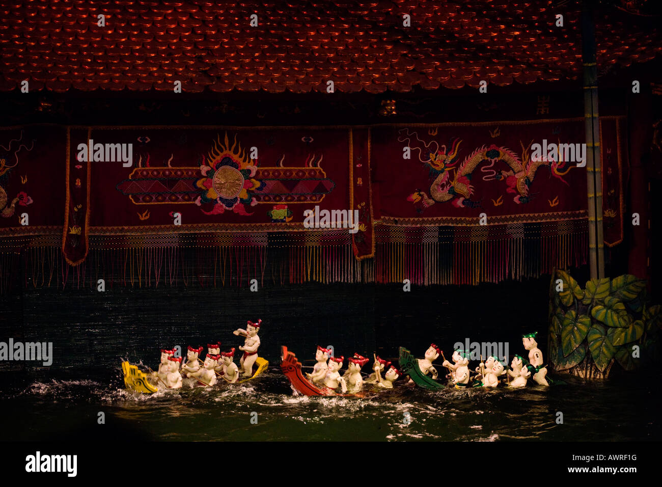 A boat race during the performance at the THANG LONG WATER PUPPET ...