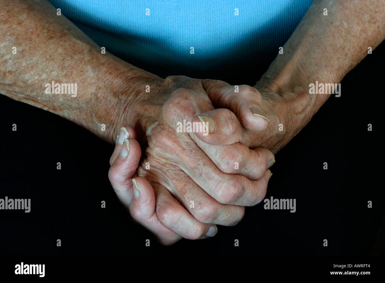 Clasped hands thumb hi-res stock photography and images - Alamy