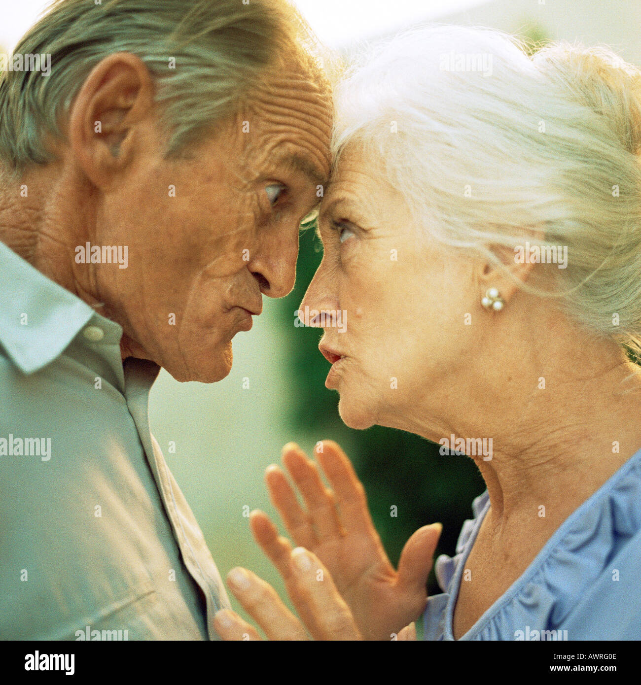 Senior man and woman having argument, side view Stock Photo - Alamy
