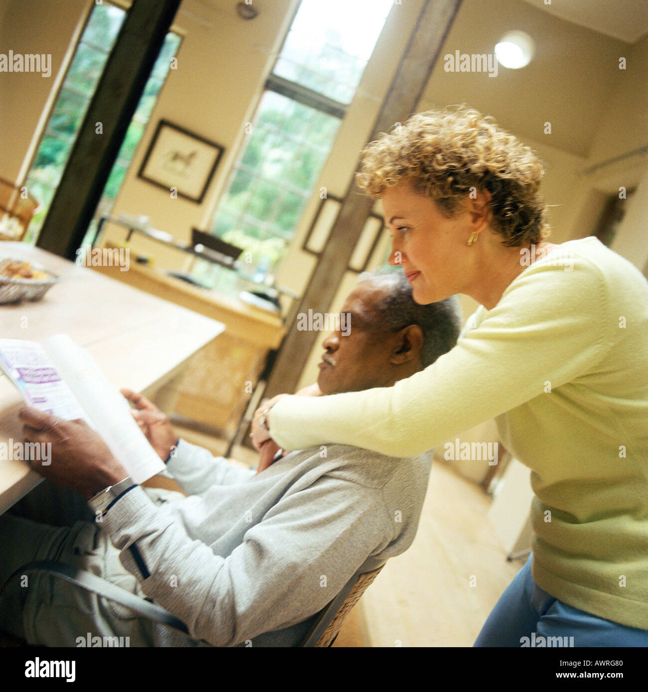 Diverse senior couples sitting table hi-res stock photography and ...