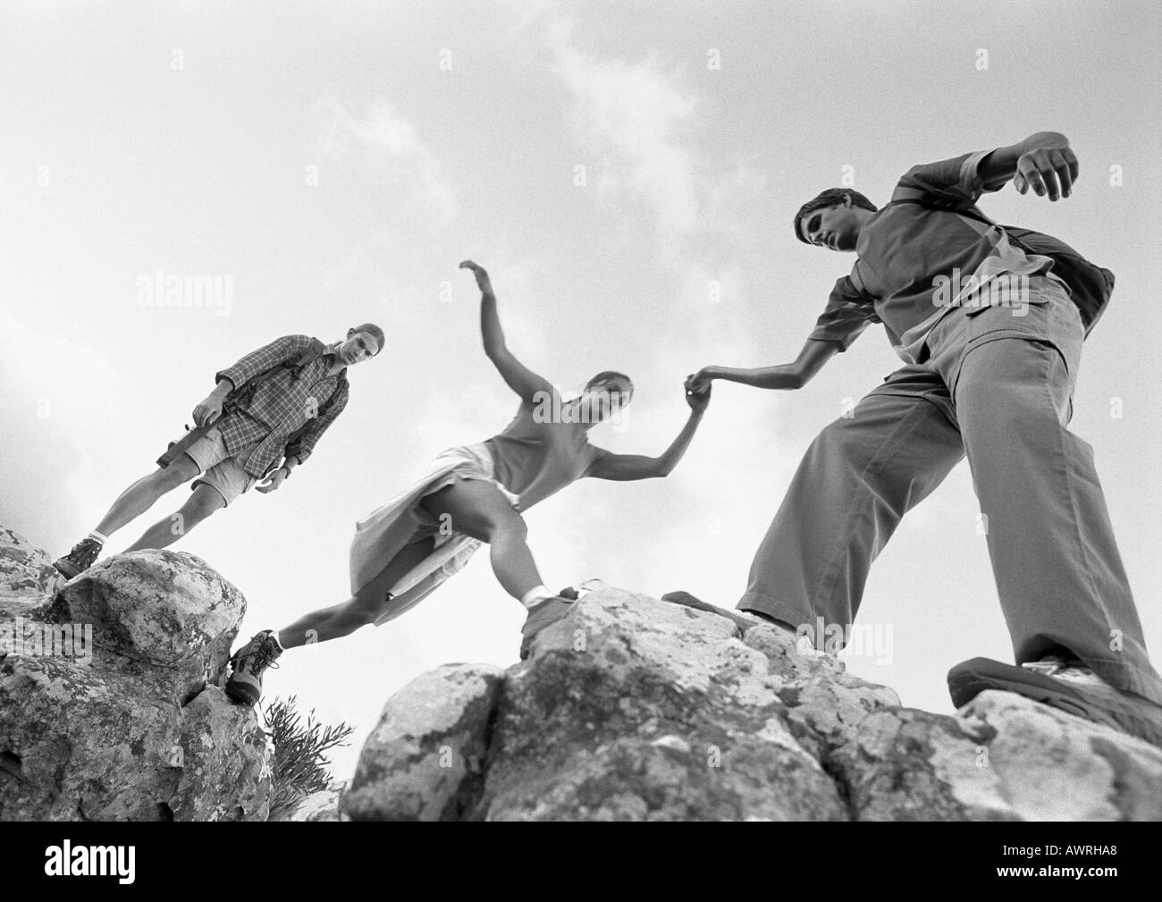 Young people climbing on Black and White Stock Photos & Images - Alamy