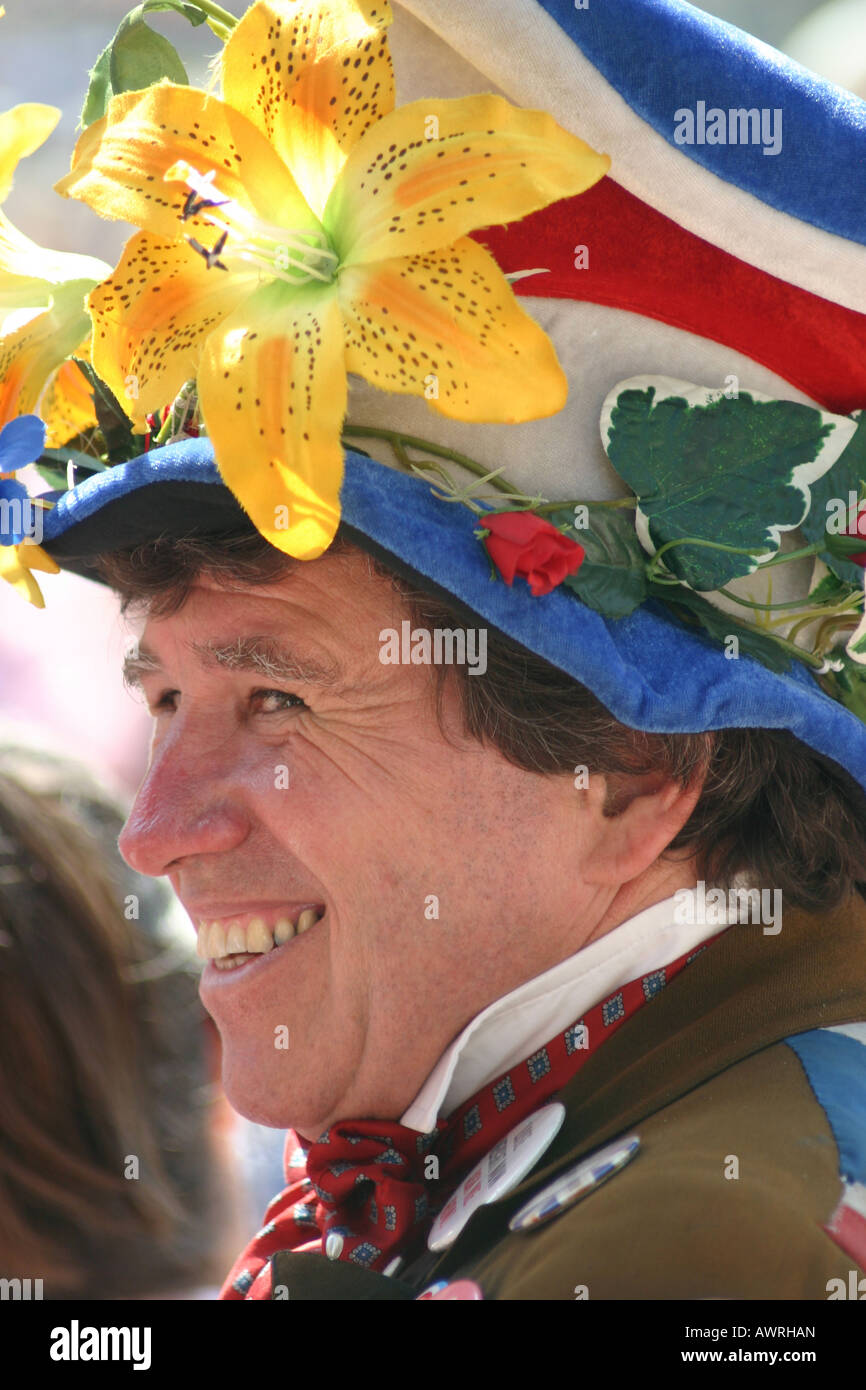 smiling morris dancer with flower in coloured hat dickens festival ...