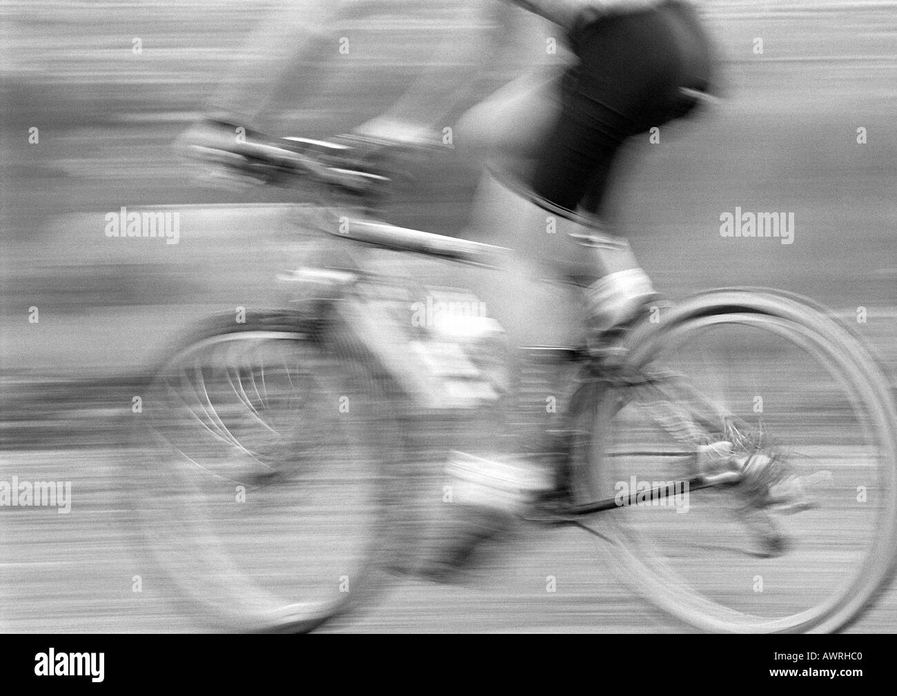 Man cycling, side view, blurred, b&w Stock Photo - Alamy