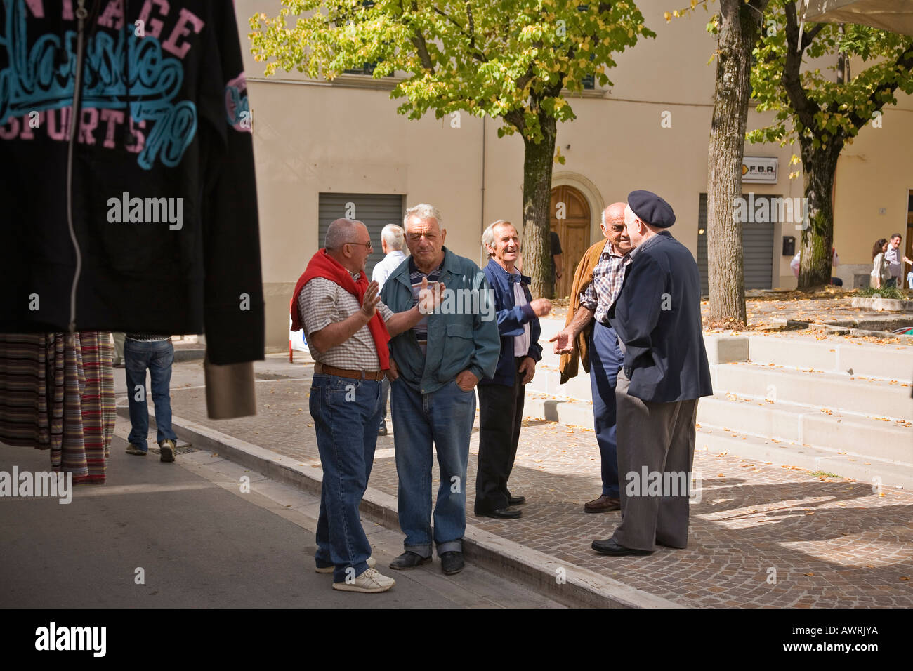 Group of friends talking italy hi-res stock photography and images - Alamy
