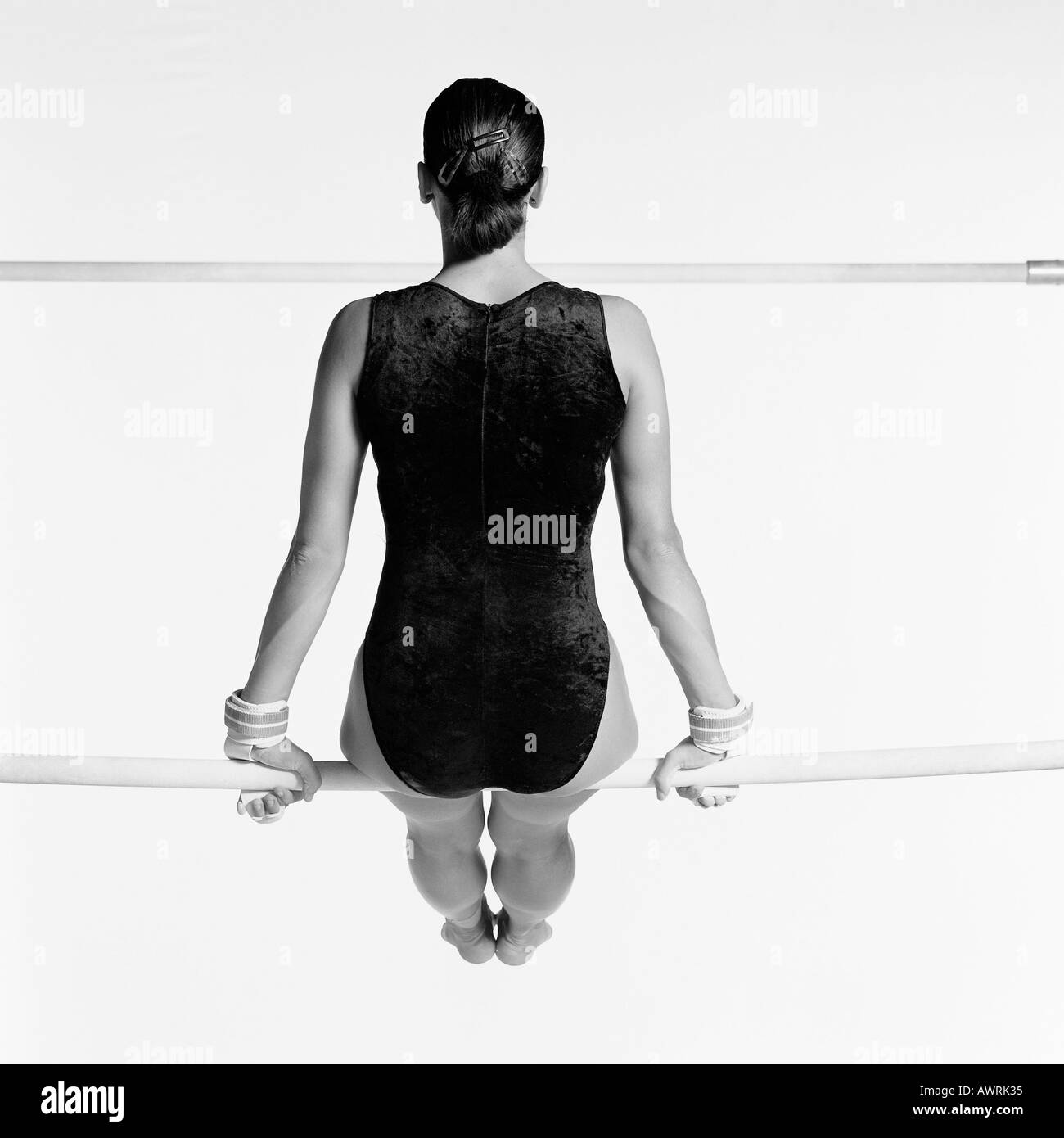 Female gymnast at bars Black and White Stock Photos & Images - Alamy