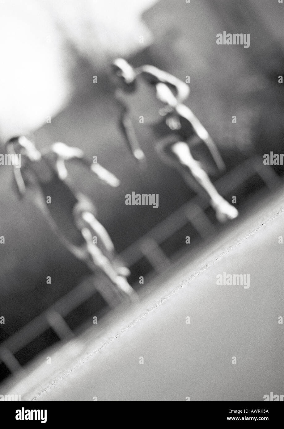 Male athletes running fast, blurred motion, b&w Stock Photo - Alamy