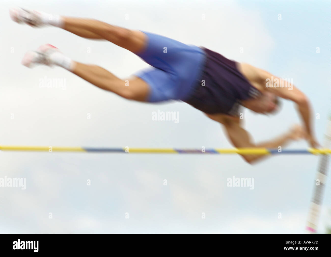 Low angle view of a blurred male cyclist on countryside track Stock ...