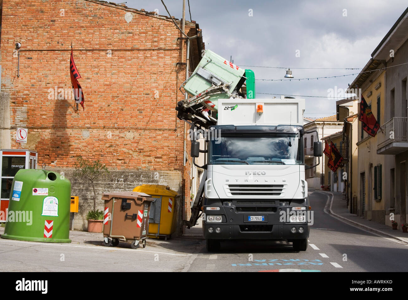 Garbage truck collecting garbage in Valiano Italy Stock Photo - Alamy