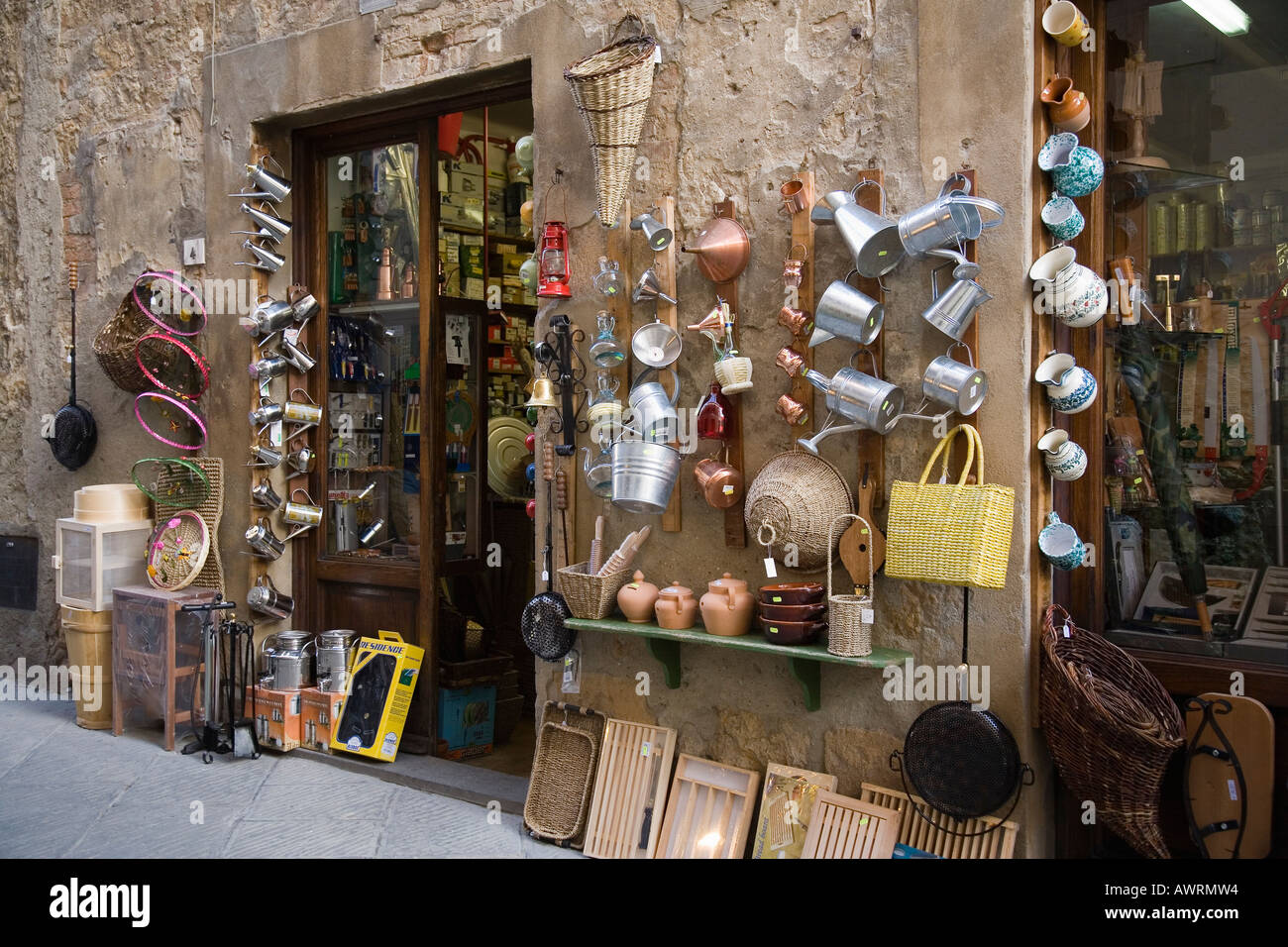 Hardware store display of pots baskets pitchers and gadgets hangs from ...