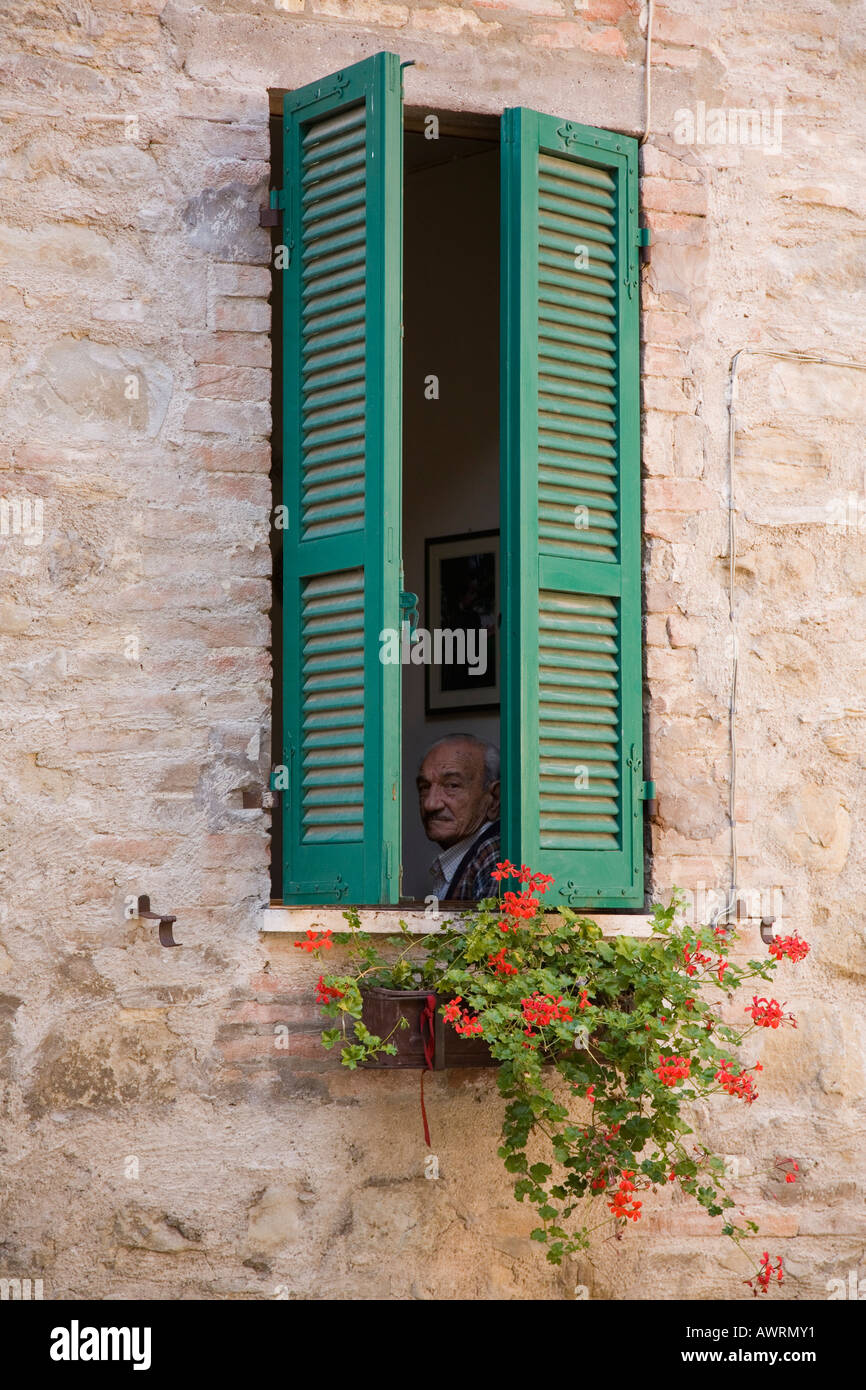 Man behind shutters hi-res stock photography and images - Alamy