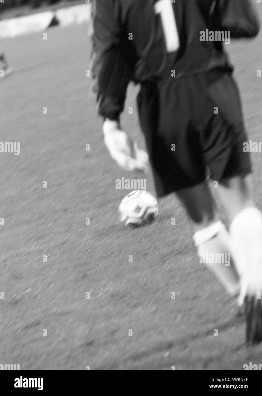 Soccer player back view Black and White Stock Photos & Images - Alamy