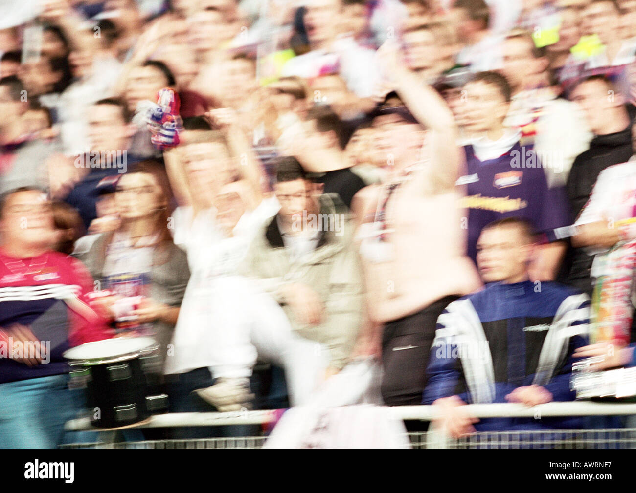 Soccer fans at a match, blurred Stock Photo - Alamy