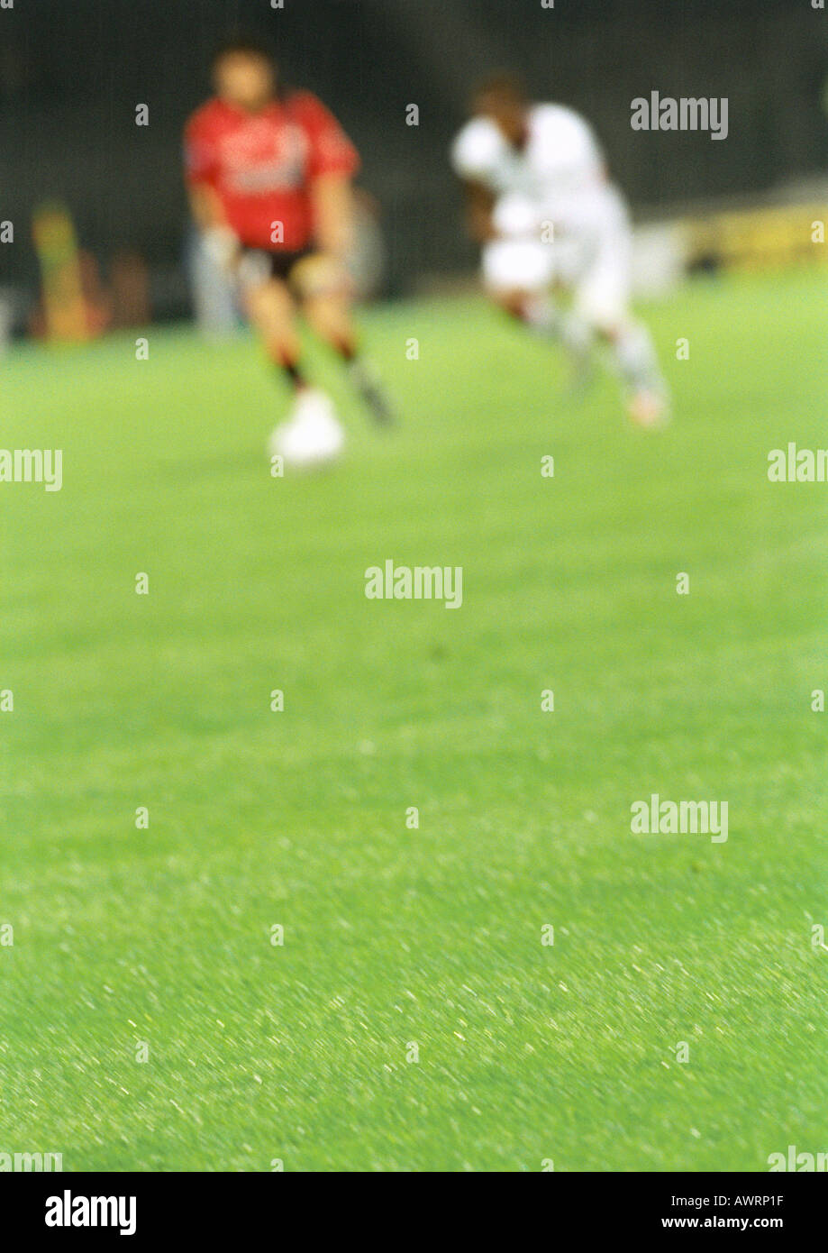 Two players chasing the ball hi-res stock photography and images - Alamy