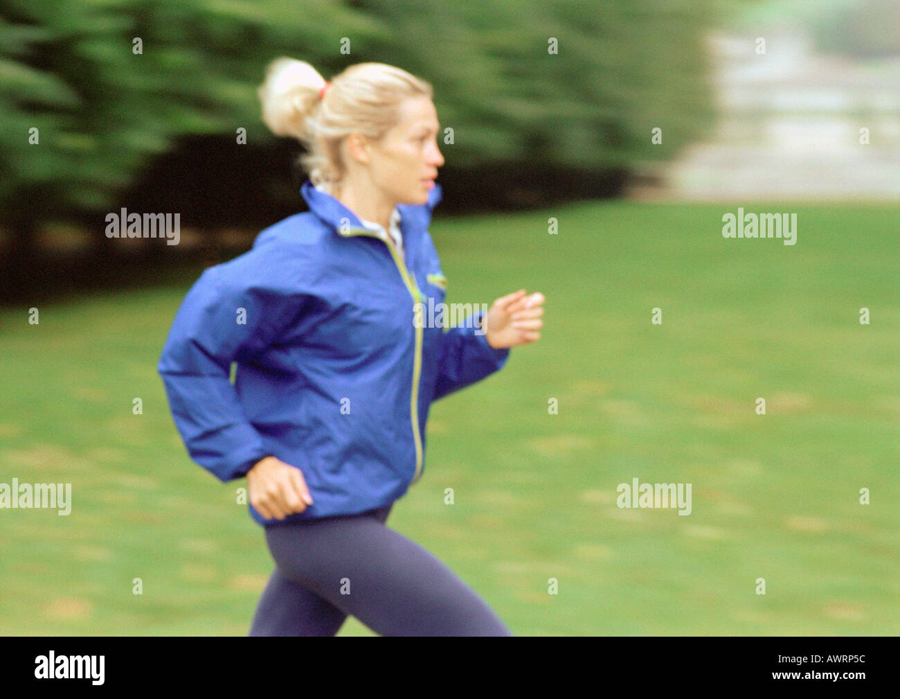 Woman running, side view Stock Photo - Alamy