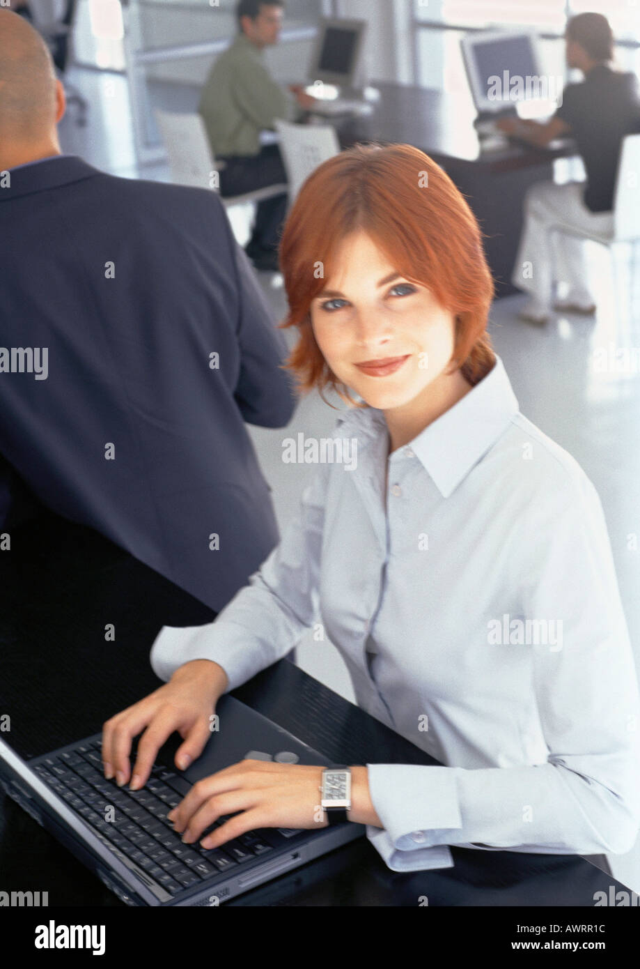 Indoor laptop person redheaded to work hi-res stock photography and ...